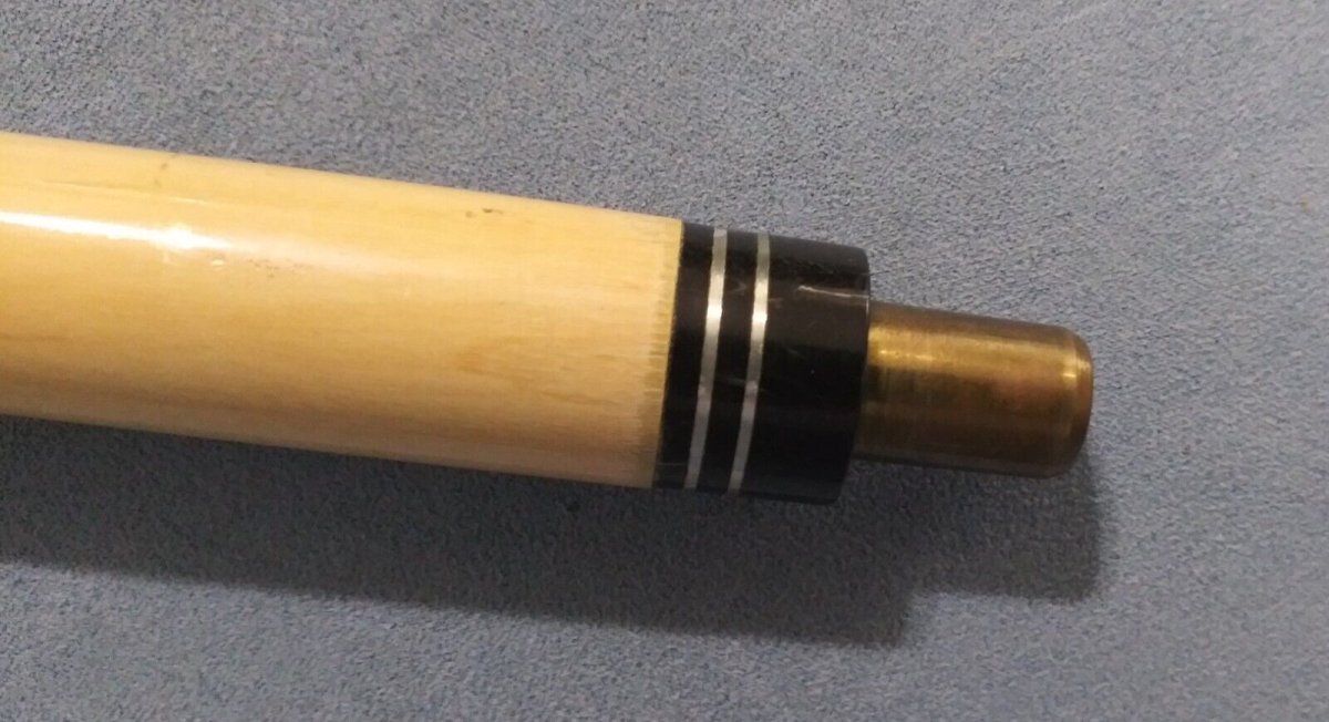 What cue is this? Got initials OL, quick release joint, Sequin, Texas ...